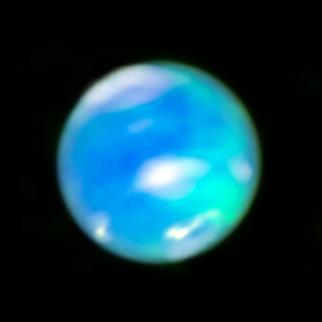 Webb Telescope's Historic Discovery of Auroras on Neptune