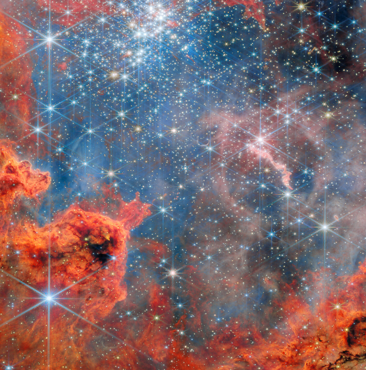 This Glowing Cloud Isn’t a Celebration — It’s Thousands of Stars Being ...